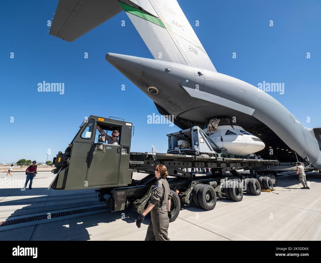 The Orion team prepares the parachute test vehicle for the final drop ...