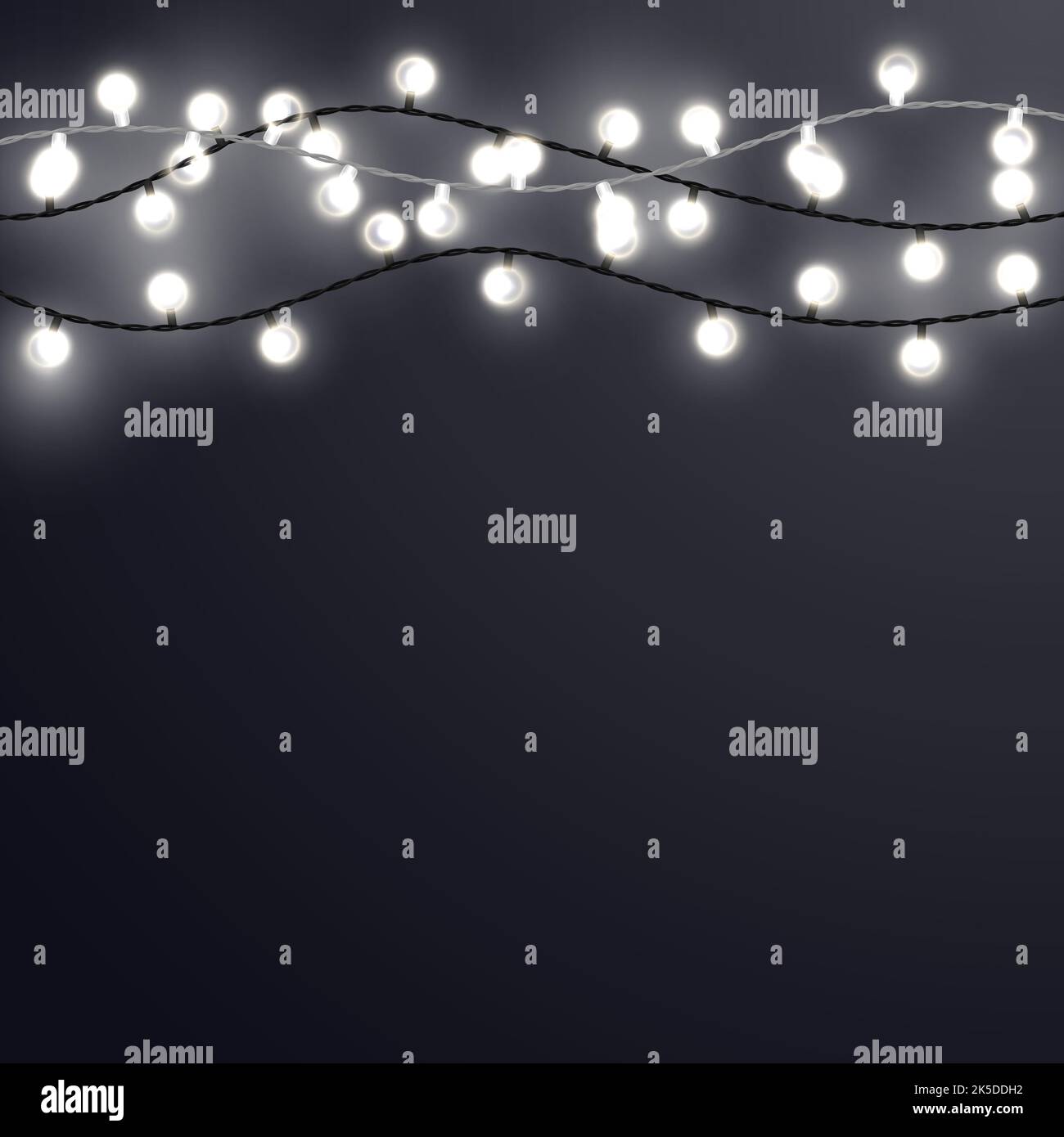 White Christmas incandescent light strings on the dark gray background ...