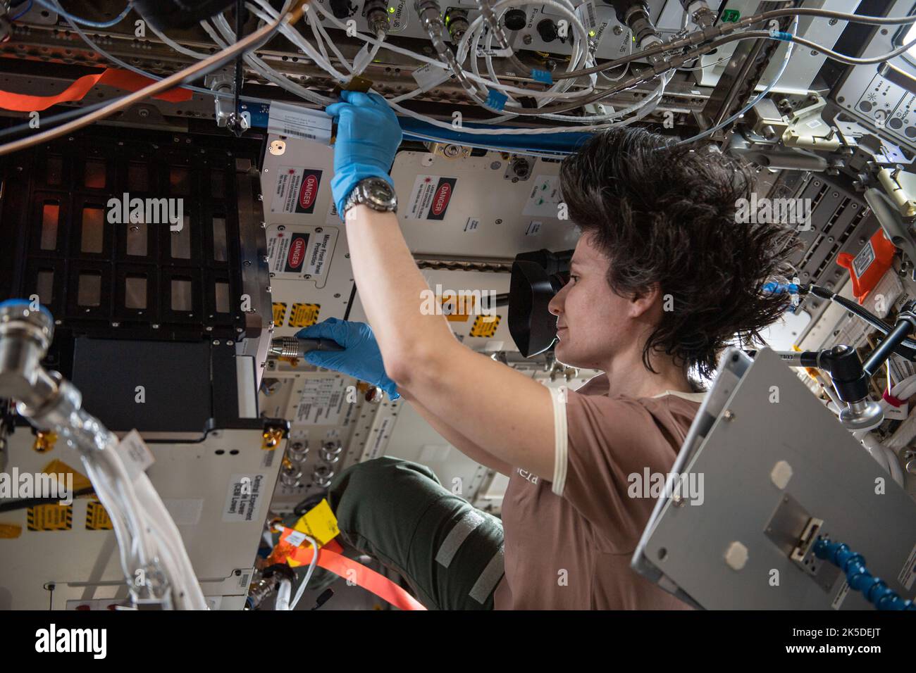 ESA (European Space Agency) astronaut Samantha Cristoforetti works on ...