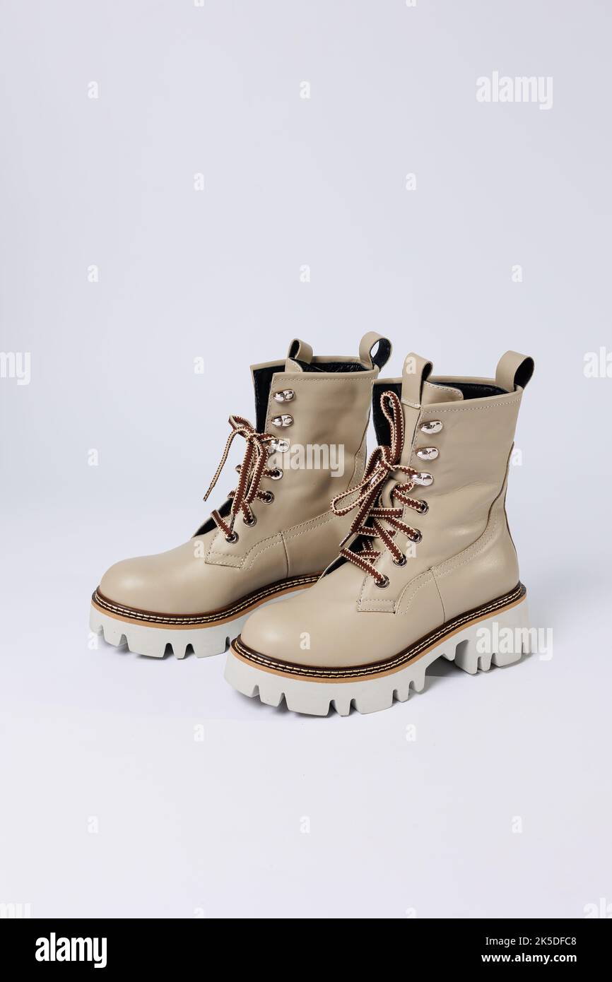 Beautiful beige shoes with genuine leather on an isolated white studio ...