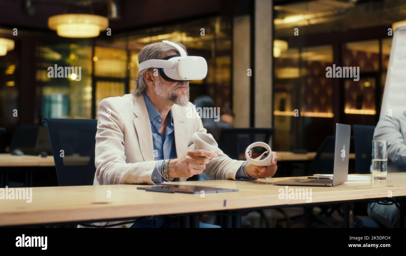 Businessman using laptop wearing headset hi-res stock photography and ...