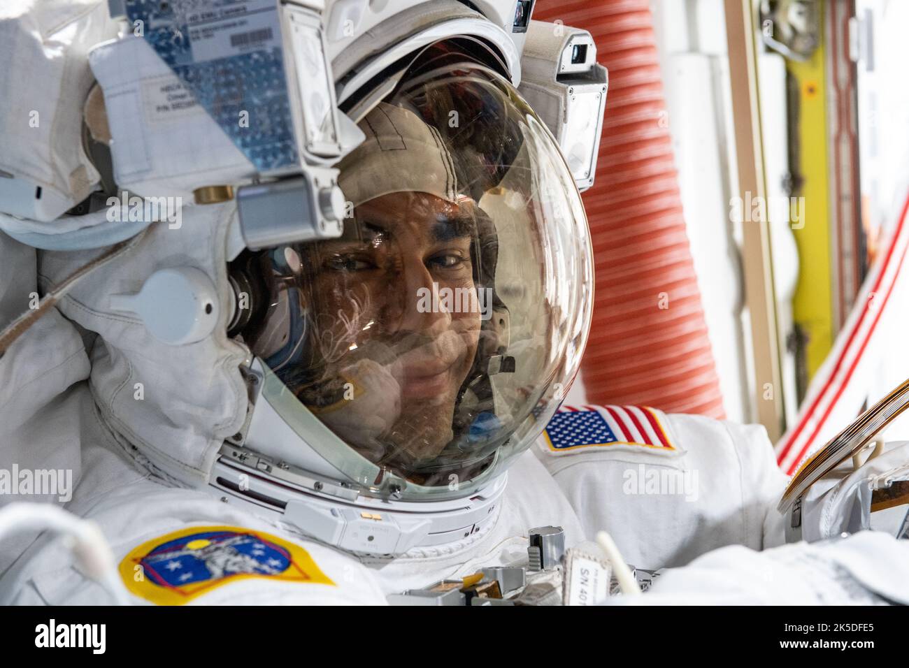 NASA astronaut Raja Chari is pictured inside the U.S. Quest airlock ...