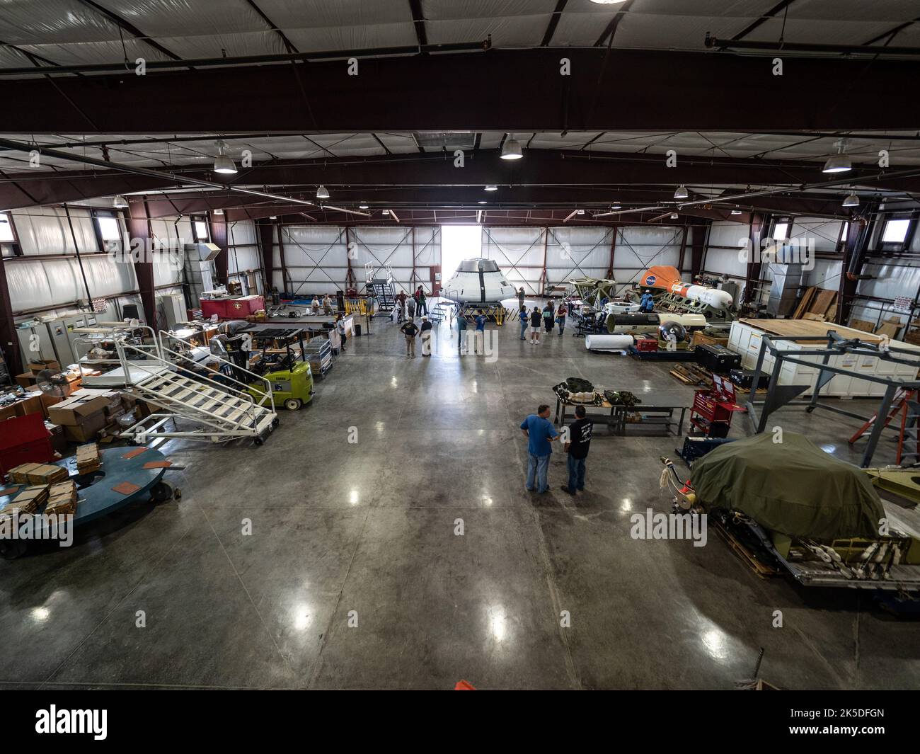 The Orion team prepares the parachute test vehicle for the final drop ...
