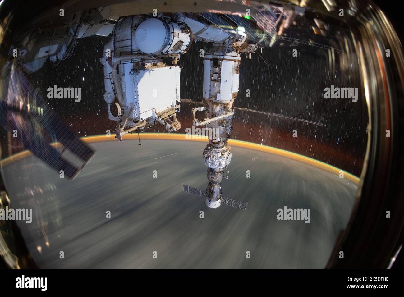 This long-duration photograph shows the Earth 259 miles below a soaring ...