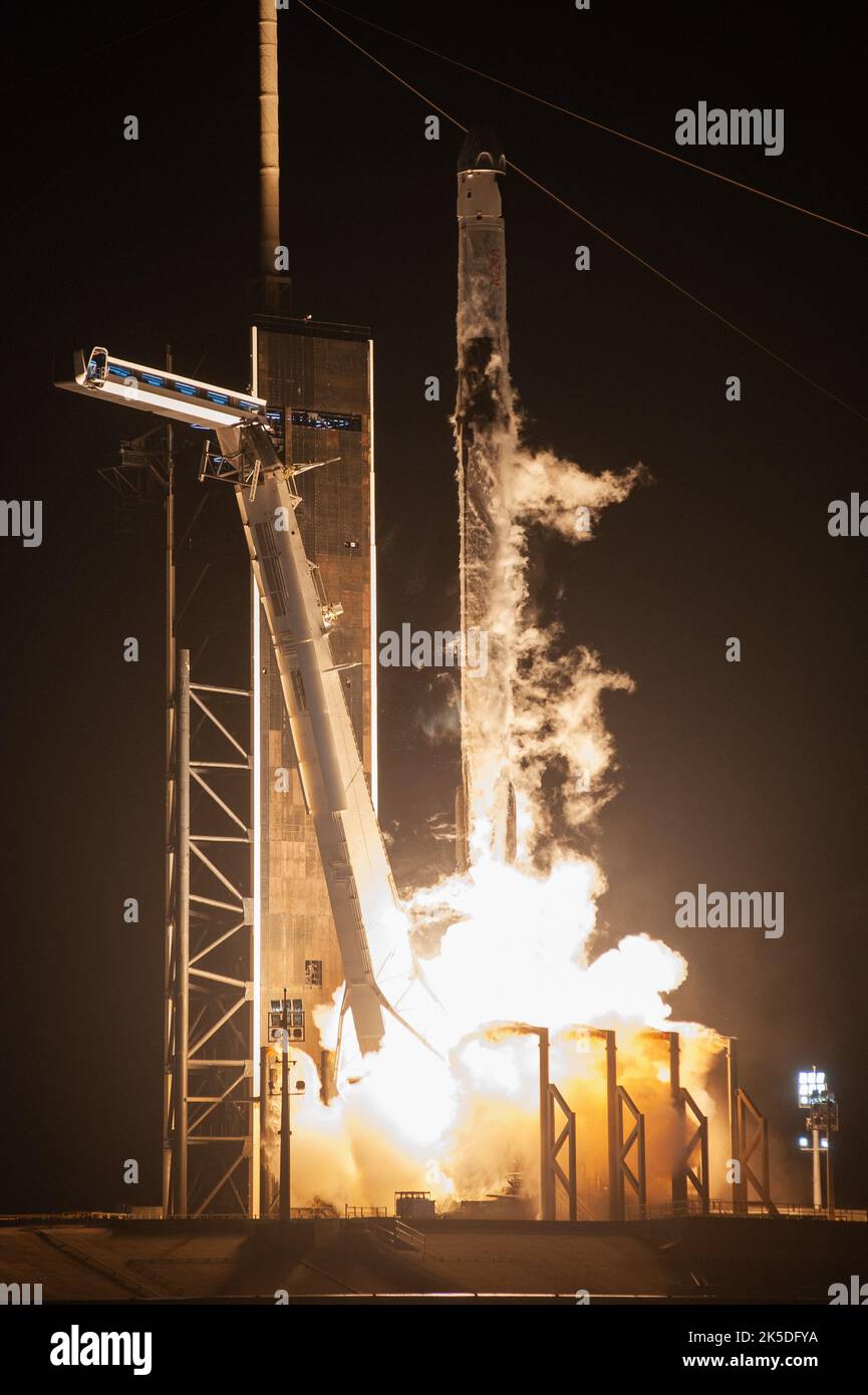 The SpaceX Falcon 9 rocket, with the company’s Crew Dragon atop, lifts ...