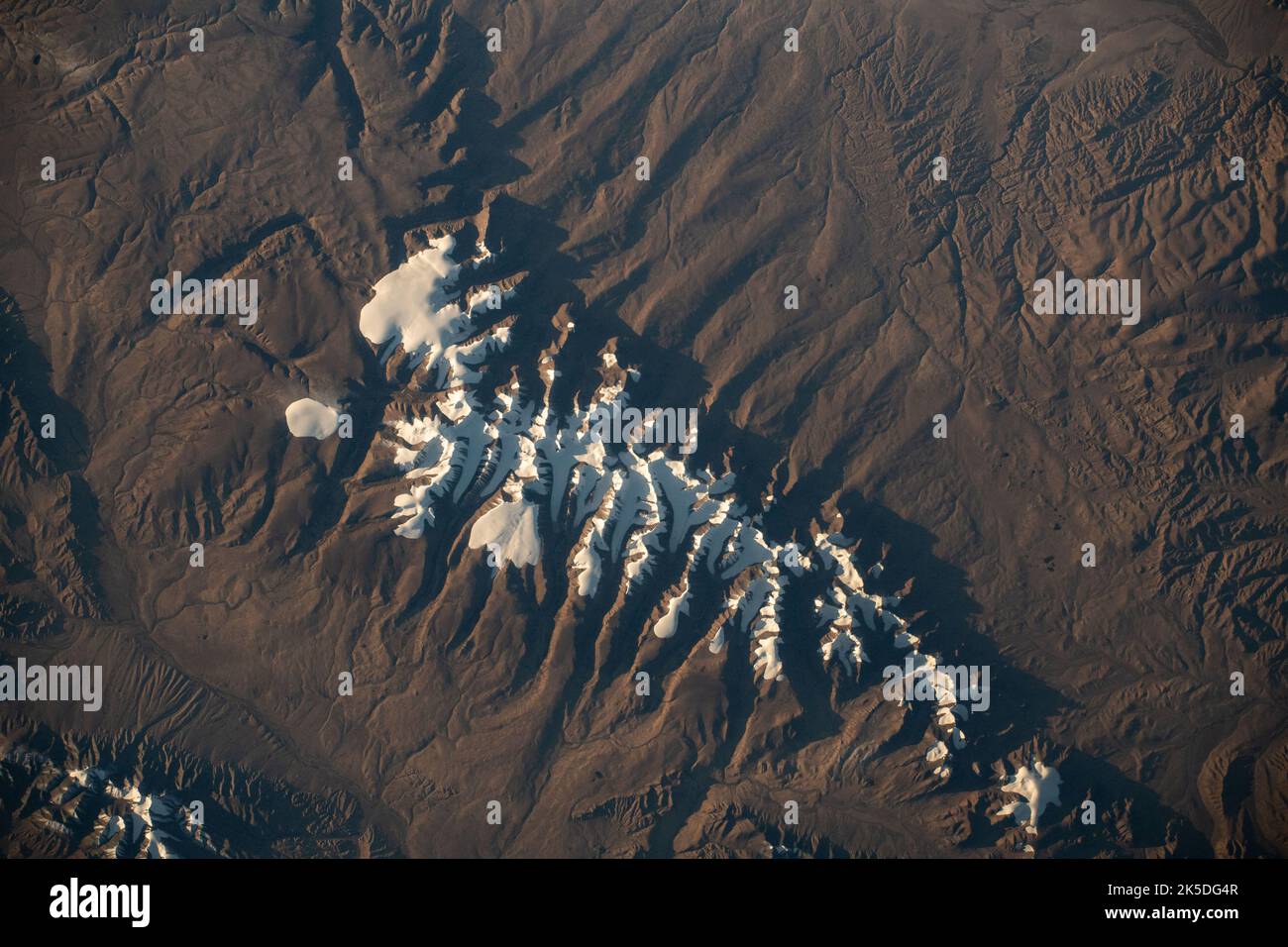 A portion of the Tanggula Mountains near Hala Lake in western China is pictured from the ...