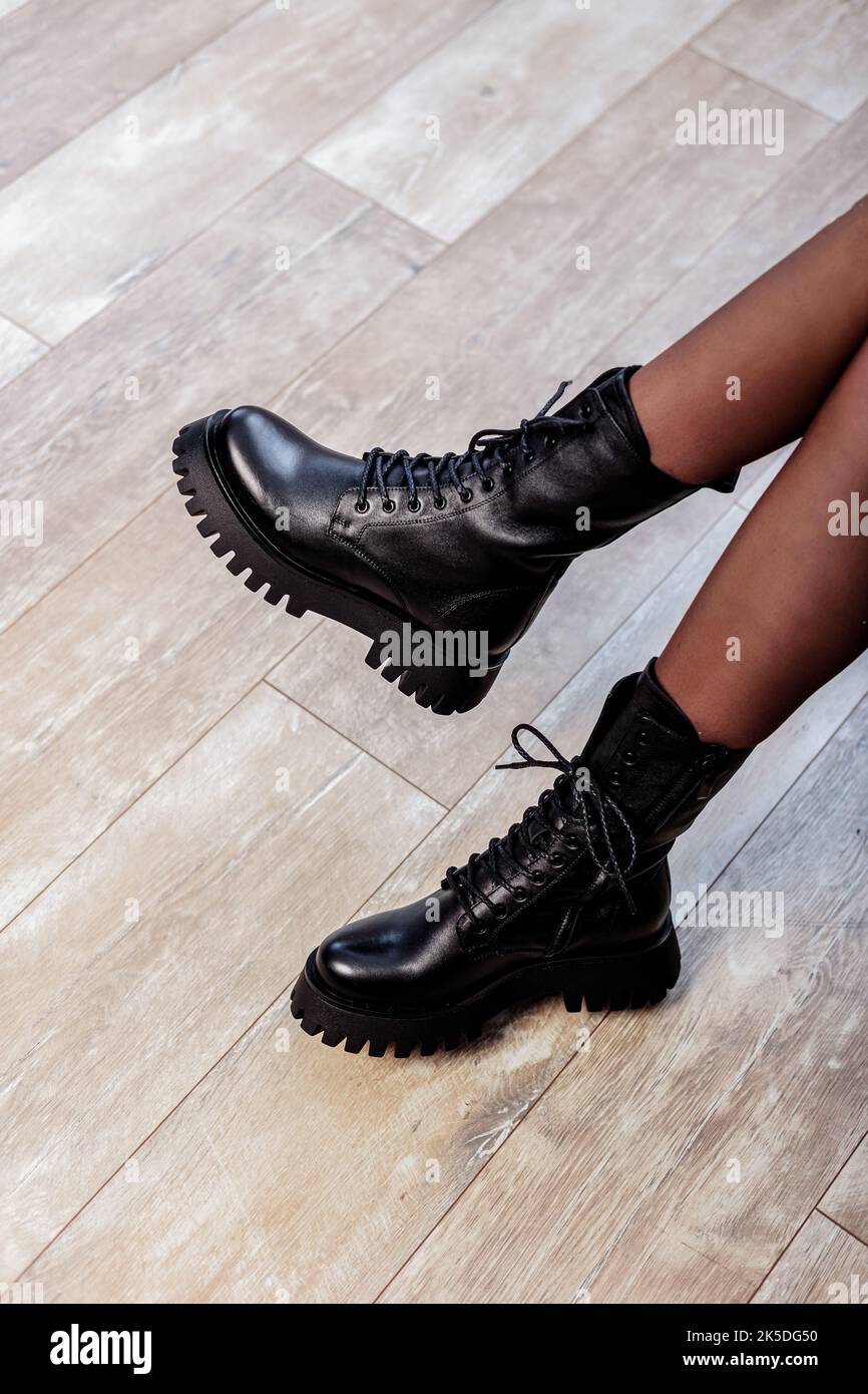 Beautiful female legs, with leather black stylish shoes. Fashionable ...