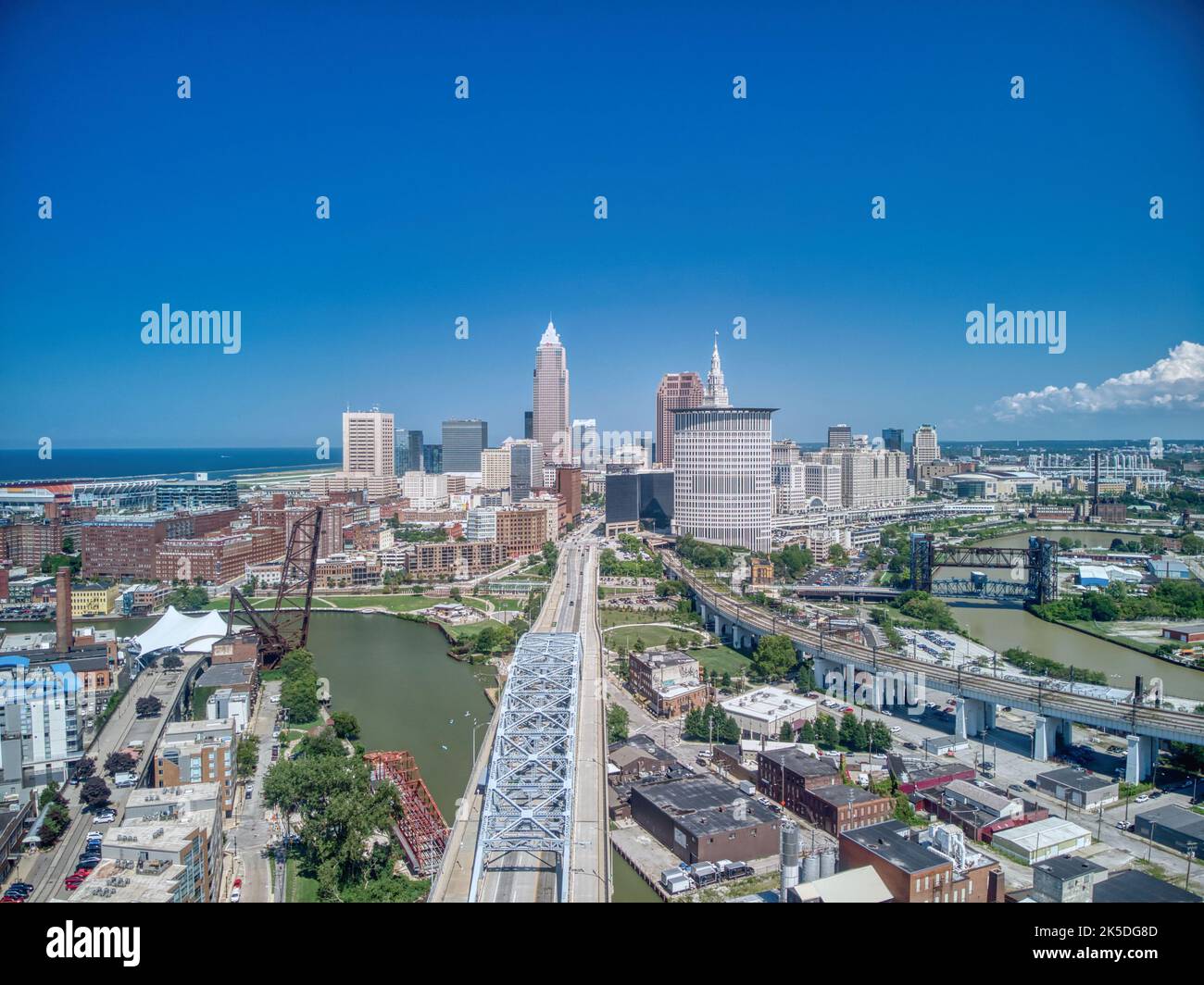 An aerial view of Cleveland downtown skyline over the bridge on a sunny ...