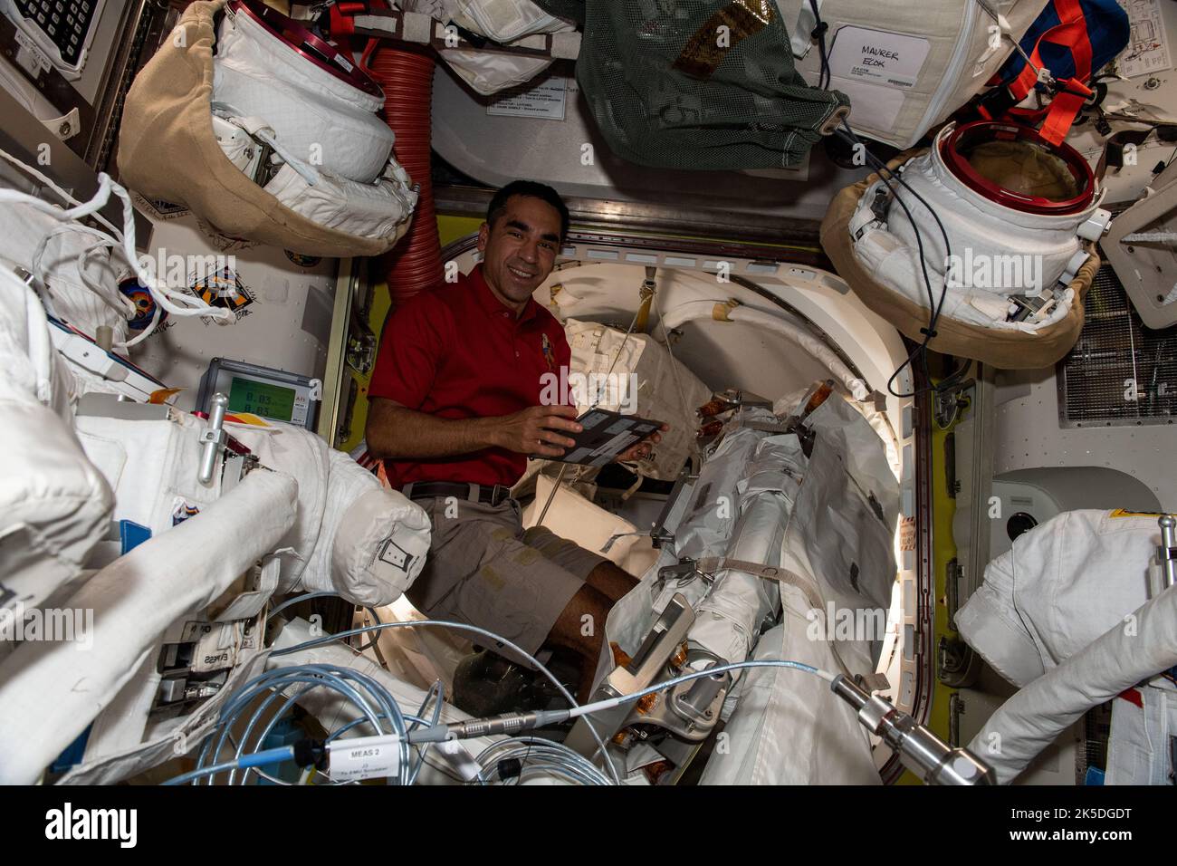 NASA astronaut and Expedition 66 Flight Engineer Raja Chari scrubs U.S ...