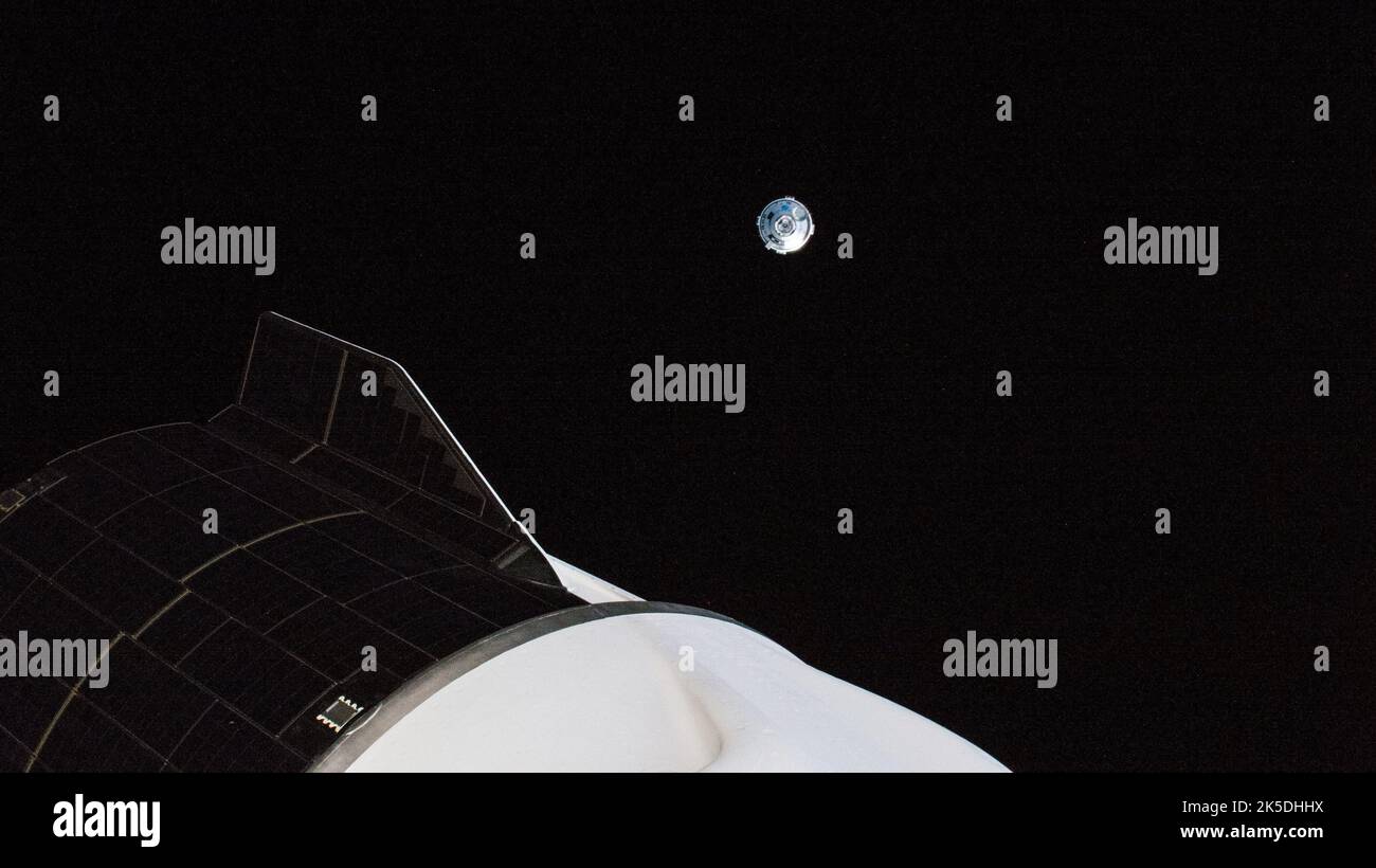 Boeing's CST-100 Starliner crew ship is pictured maneuvering away from ...