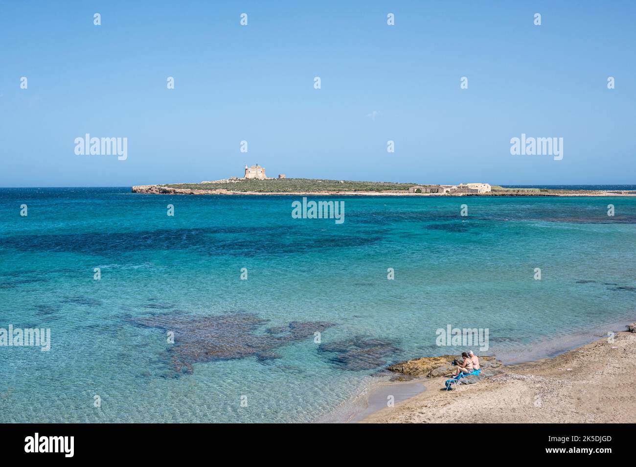 Portopalo, Italy: 09-15-2022: Portopalo beach in front of the island of ...