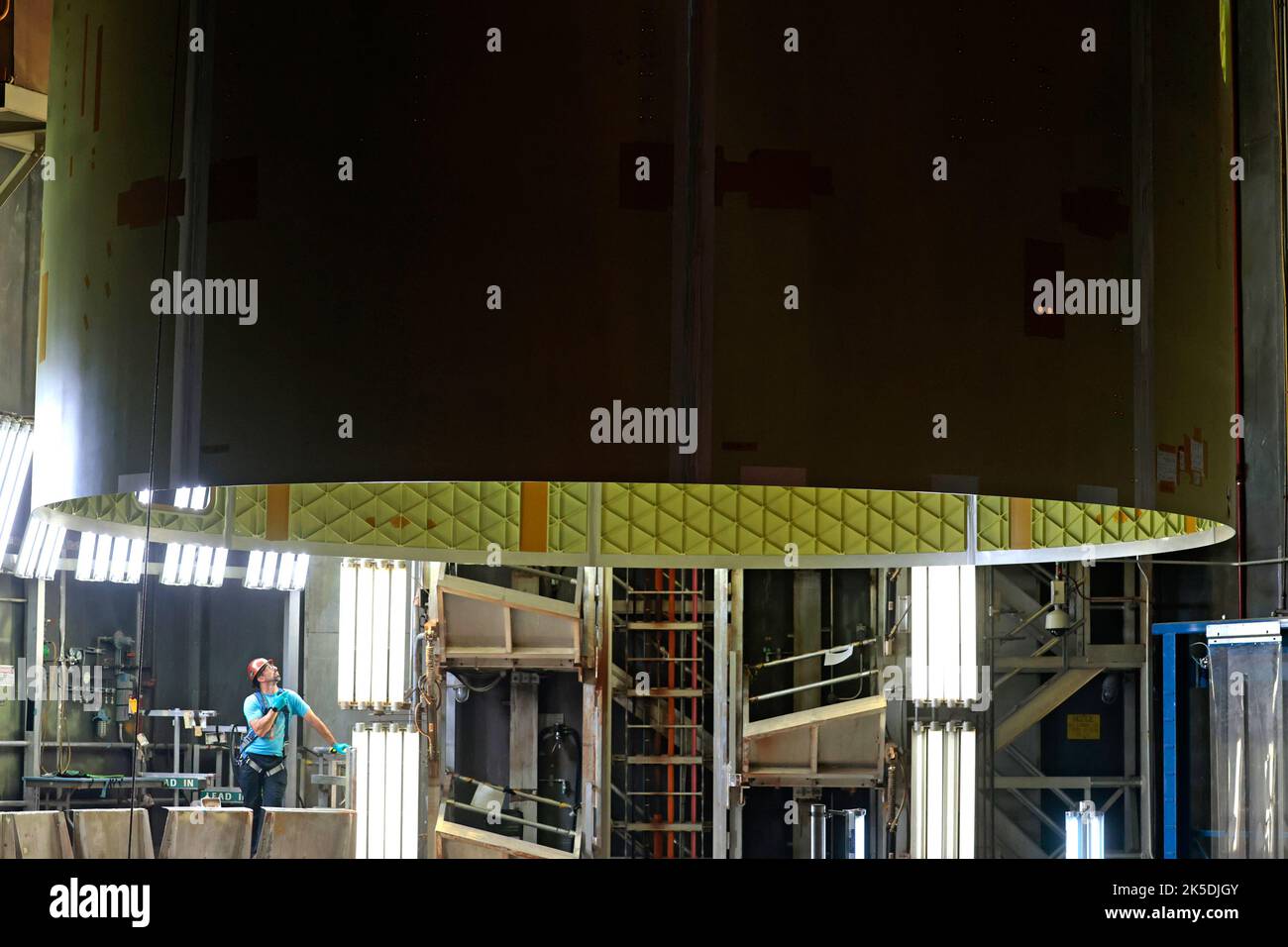 NASA technicians move the Artemis IV SLS rocket engine section at ...