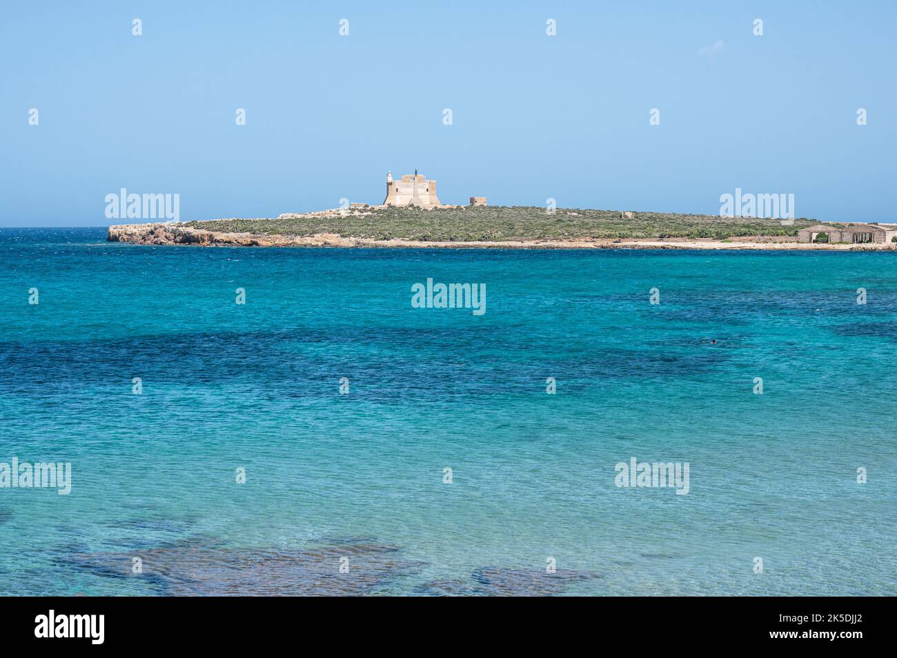 The island of Capo Passero in Portopalo where the Mediterranean and the ...