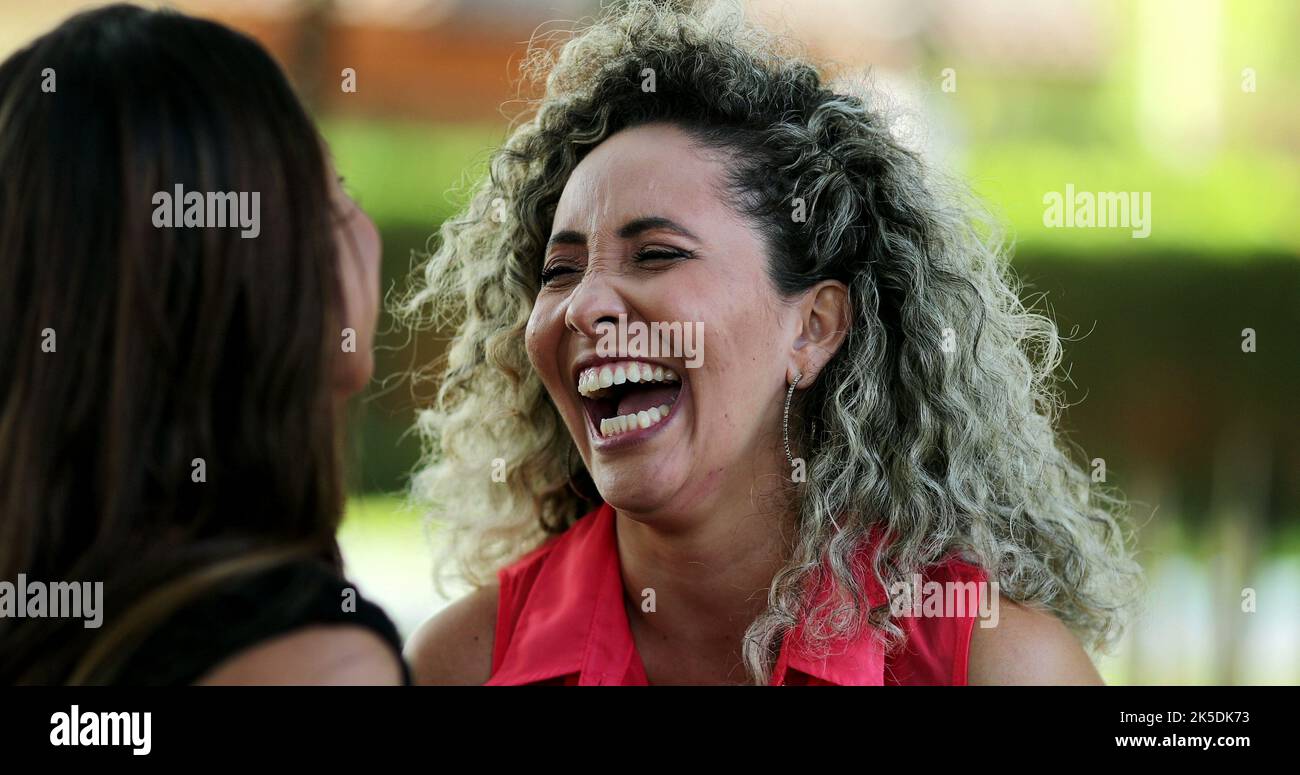 Two friends in laughter, people real life laugh and smile. girlfriends ...