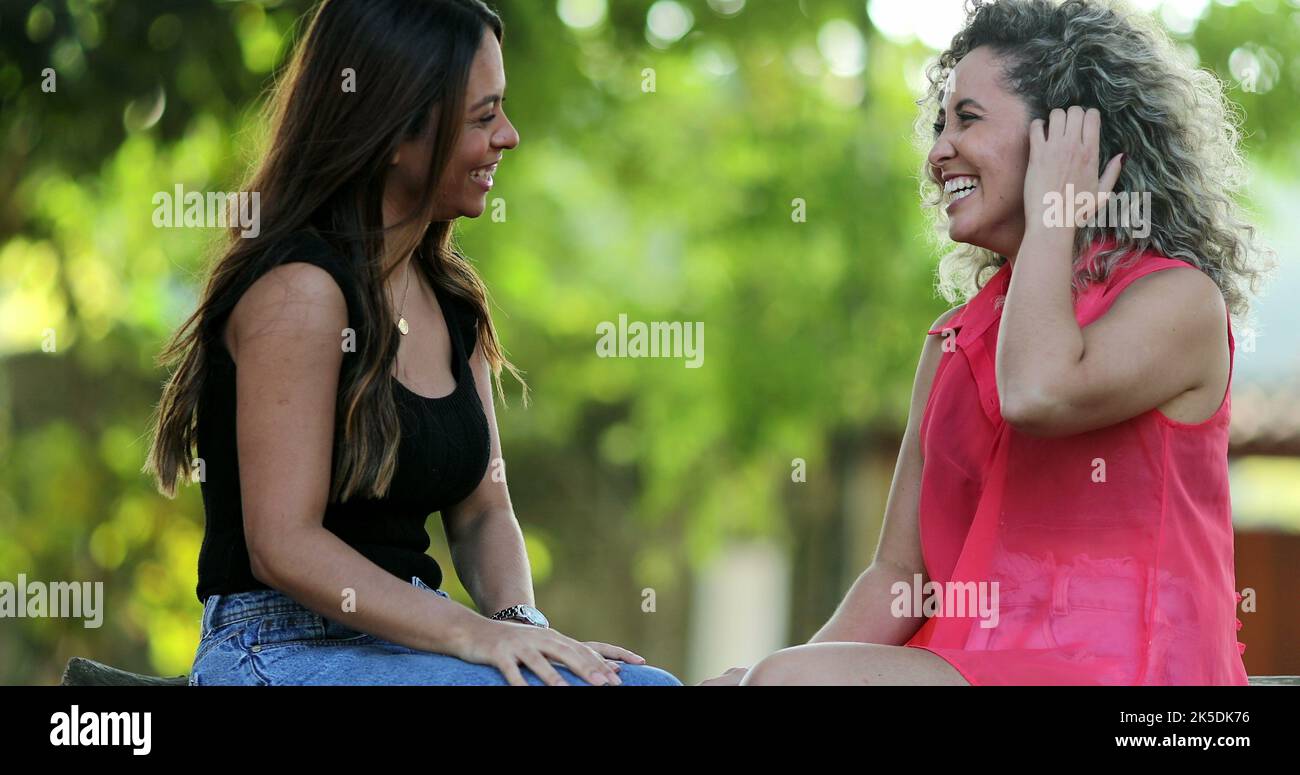 Two friends in laughter, people real life laugh and smile. girlfriends ...