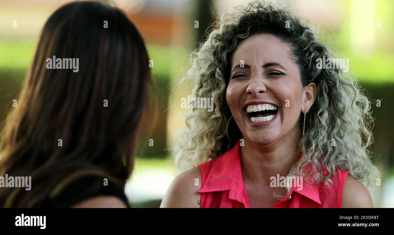 Two friends in laughter, people real life laugh and smile. girlfriends ...