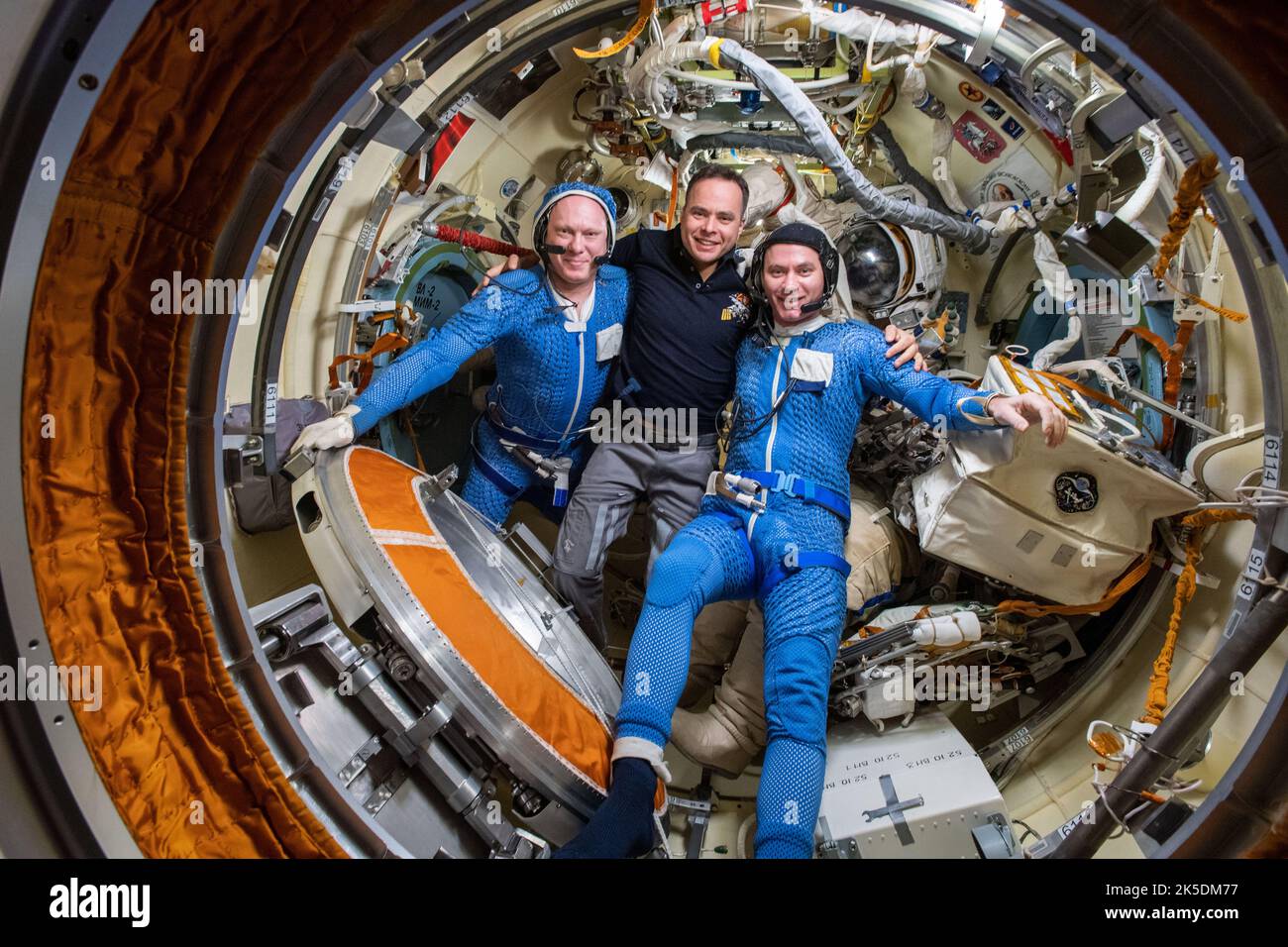 Roscosmos cosmonauts (from left) Oleg Artemyev, Sergey Korsakov and ...