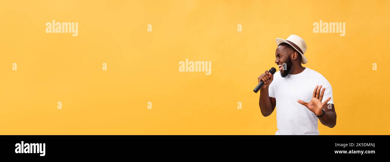 Young teenage black African American boy singer performing at a concert ...