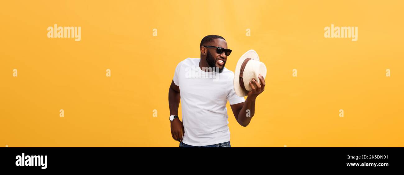 Young black man top dancing isolated on a yellow background Stock Photo ...