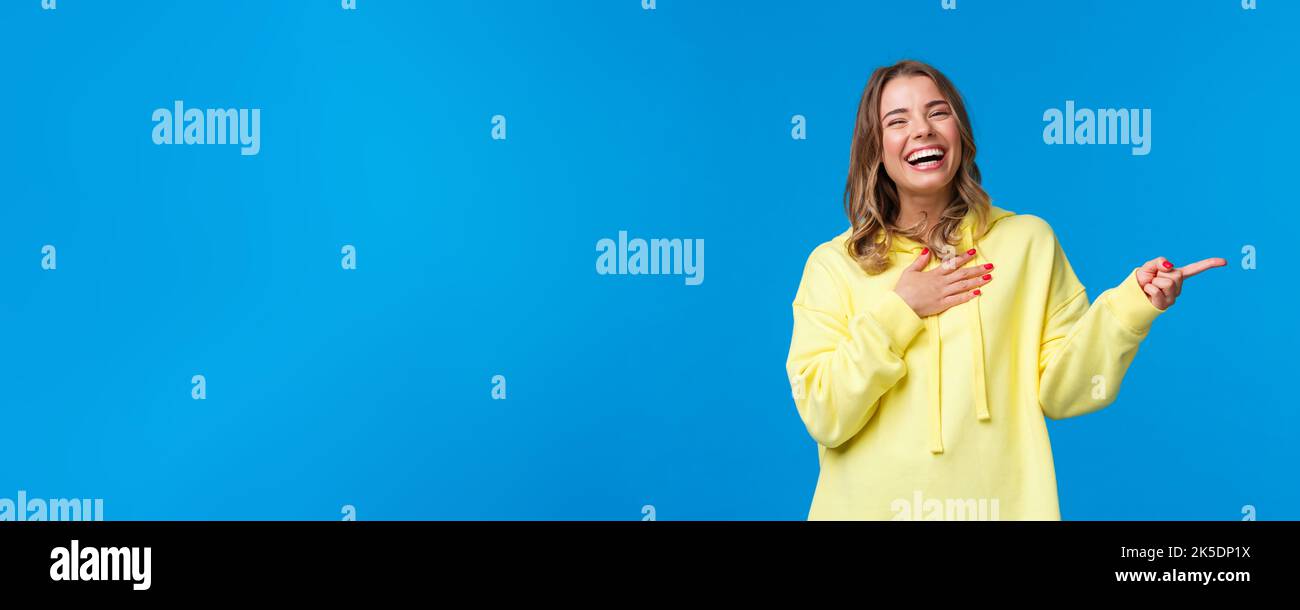 Waist-up portrait of laughing girl having fun, discuss hilarious ...
