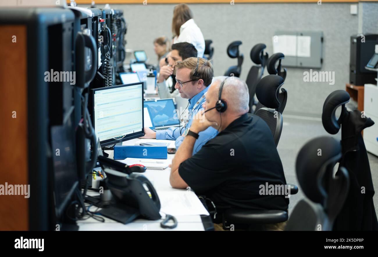 Members of the Artemis I launch team are seen at the test directors ...