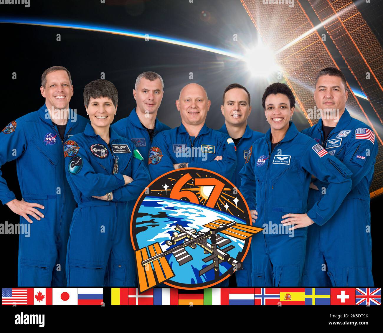 The official portrait of the seven-member Expedition 67 crew. From left ...