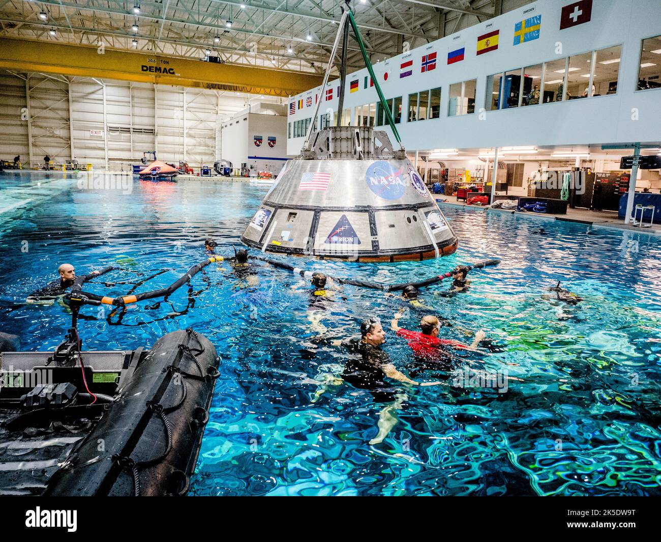 Navy divers, Air Force pararescuemen, and Coast Guard swimmers perform ...