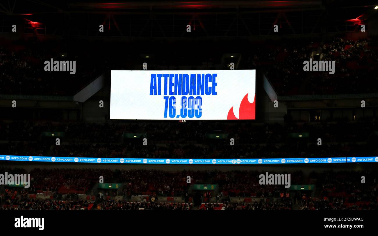 The big screen shows the attendance of 76,893 during the international ...