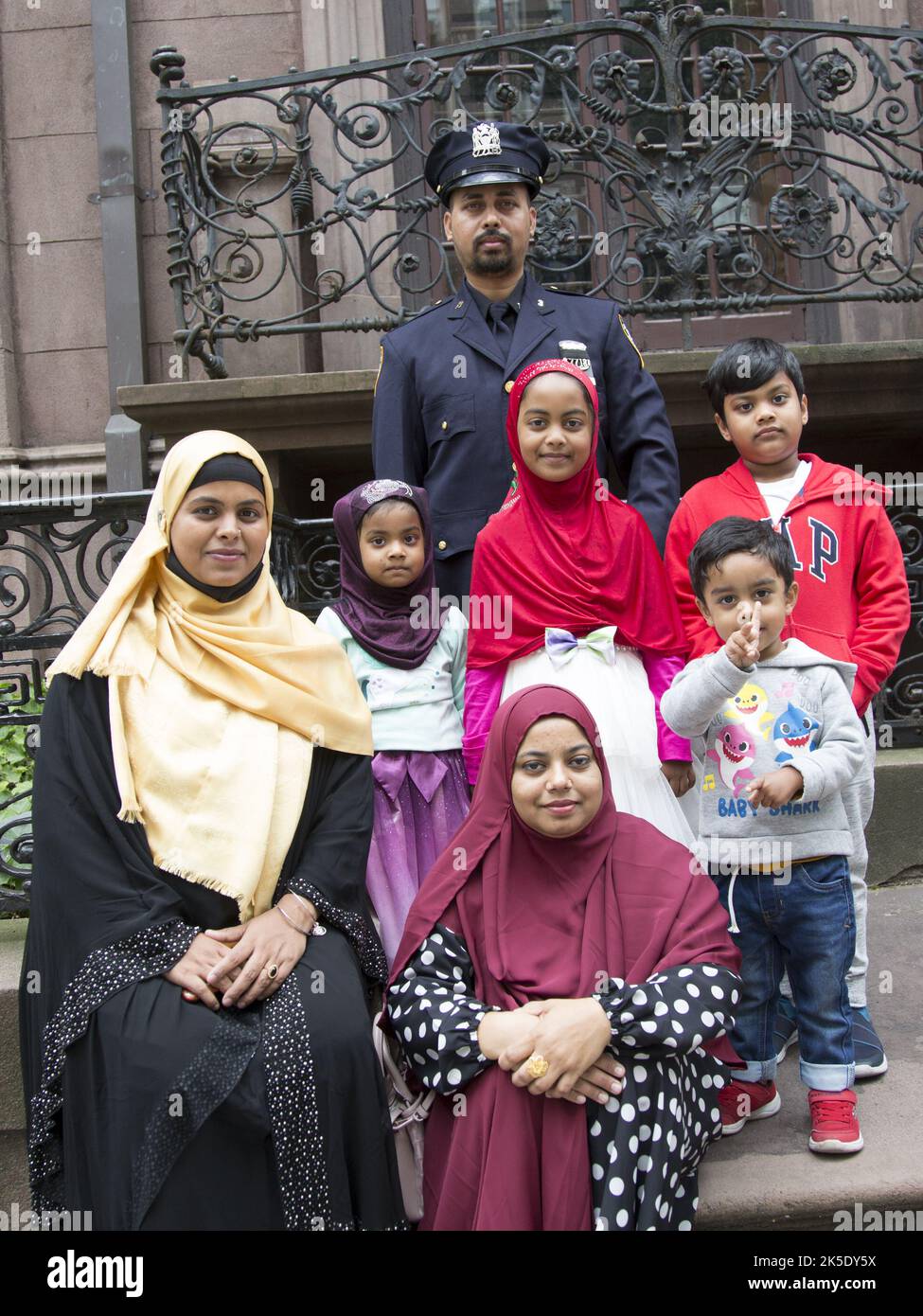 Bangladeshi NYPD transit policeman with families at the American Muslim ...