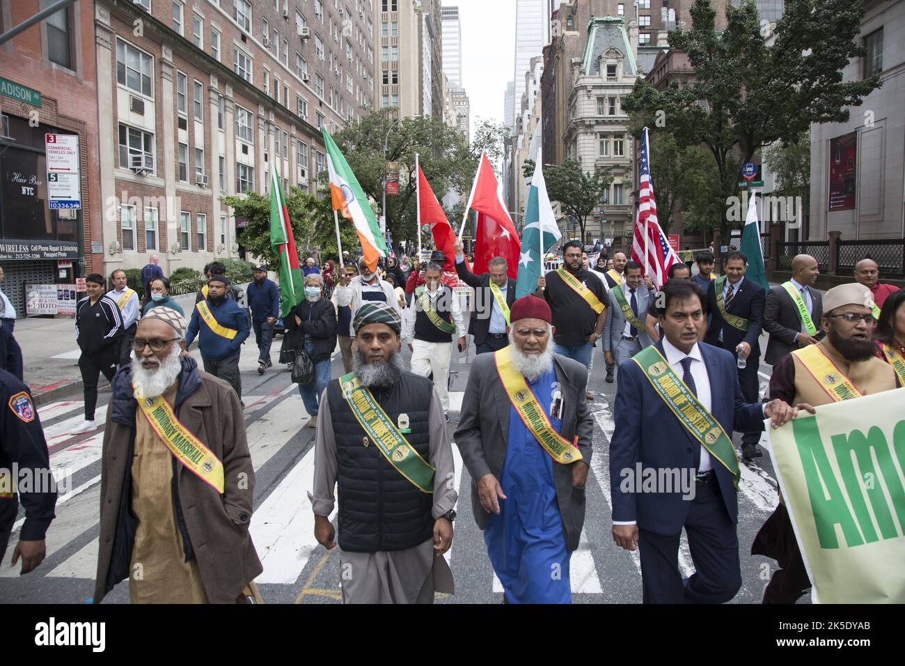 Community dignitaries lead the American Muslim Day Parade down Madison ...