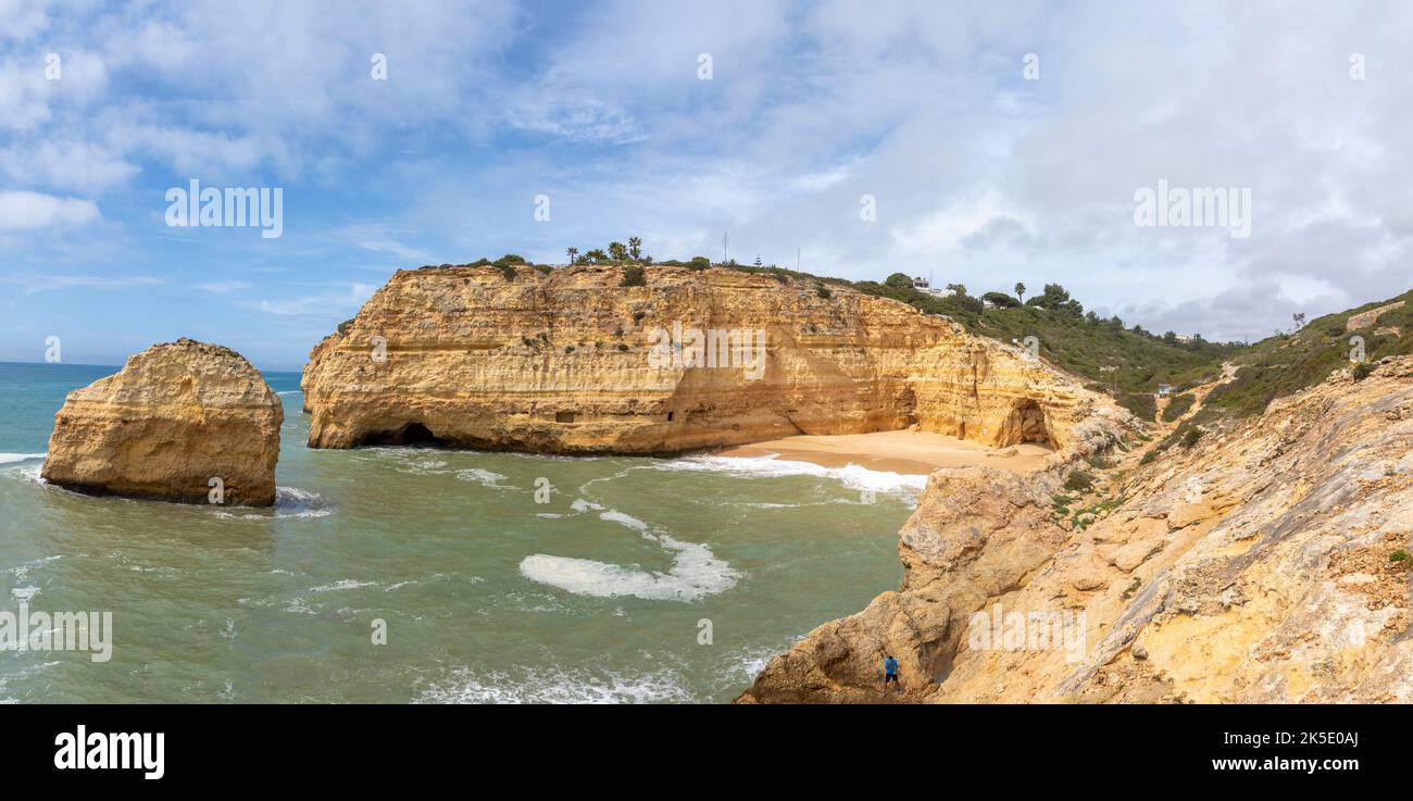 scenic cliff landscape with beach at the coastline of the Algarve in ...