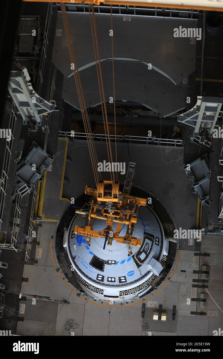 The Boeing CST-100 Starliner spacecraft is lifted at the Vertical ...