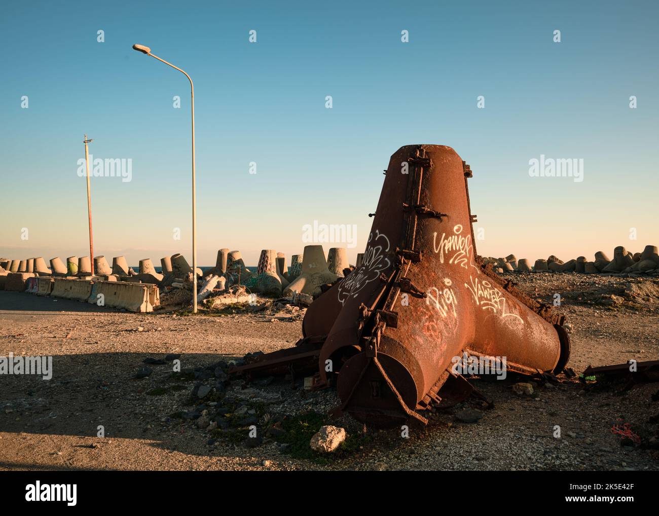 The tetrapod molds for concrete blocks that protect the shoreline ...