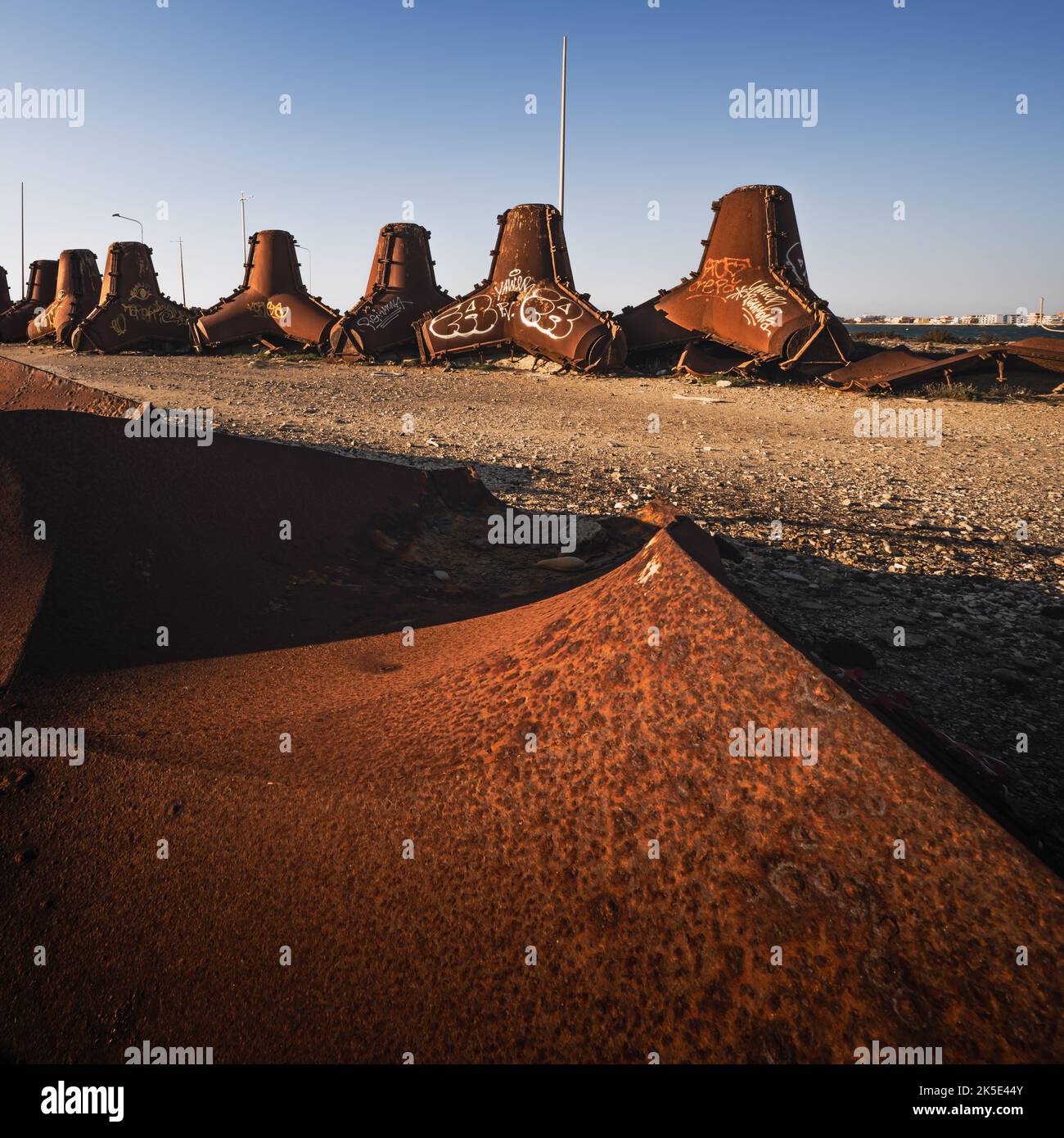 The tetrapod molds for concrete blocks that protect the shoreline ...