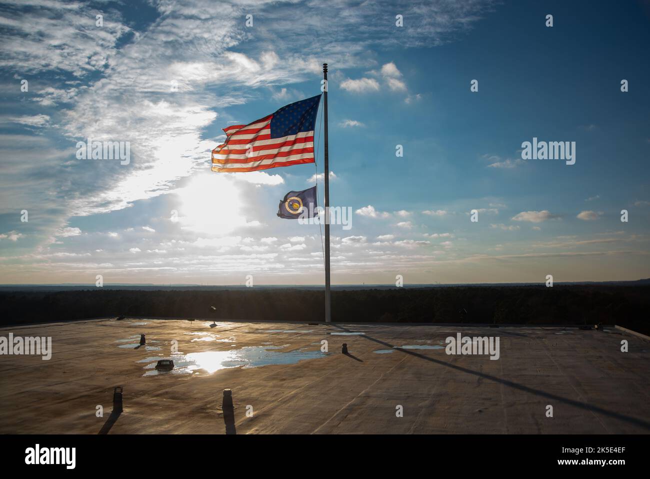 The U.S. and NASA flags atop Building 4200 at NASA Marshall Space ...