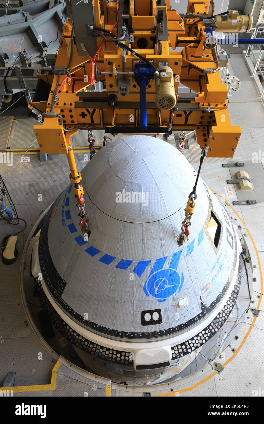The Boeing CST-100 Starliner spacecraft is lifted at the Vertical ...
