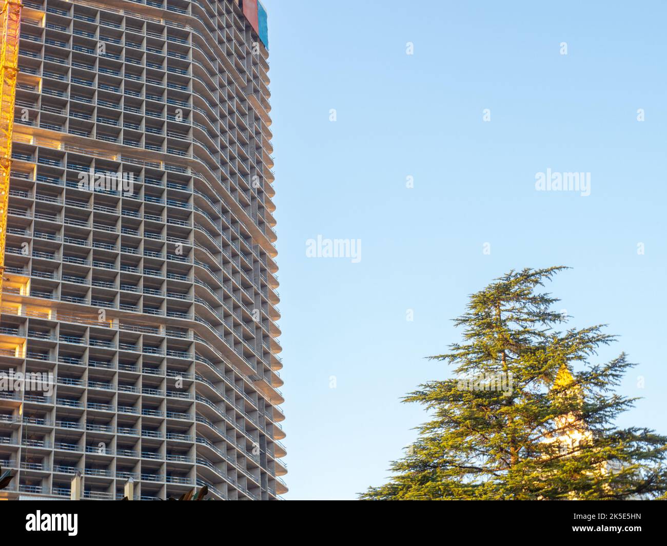 The frame of a high-rise building under construction. Reinforced ...