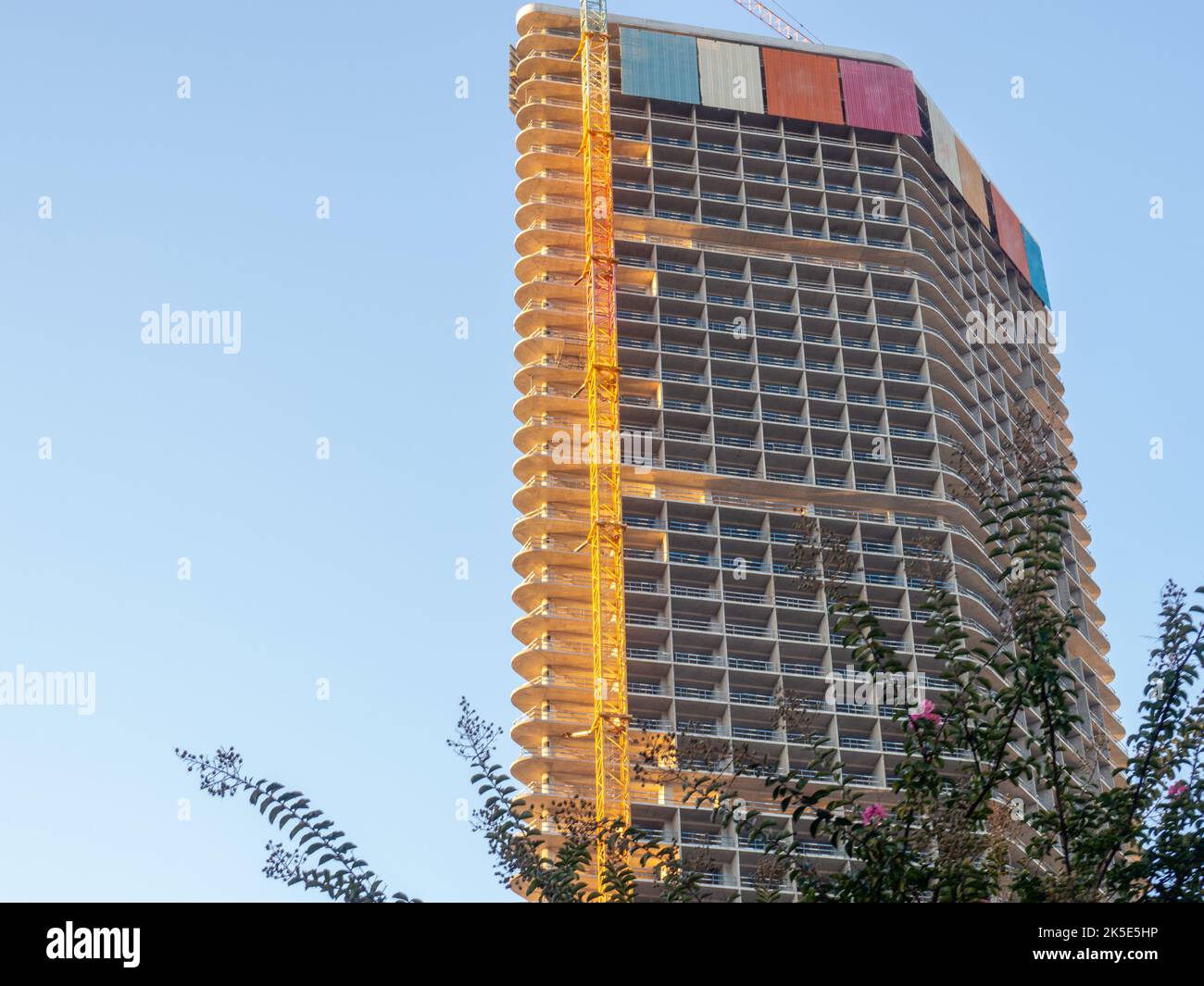 The frame of a high-rise building under construction. Reinforced ...