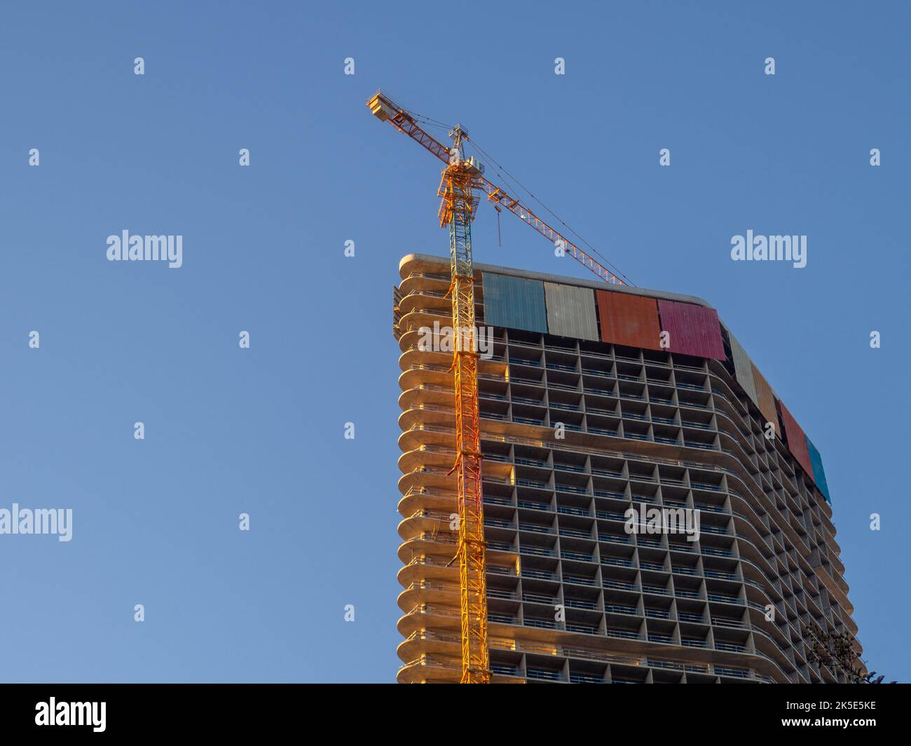 The frame of a high-rise building under construction. Reinforced ...
