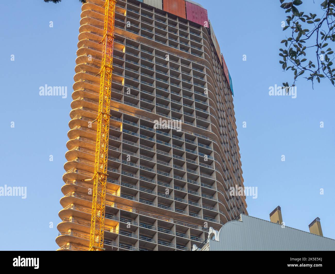 The frame of a high-rise building under construction. Reinforced ...