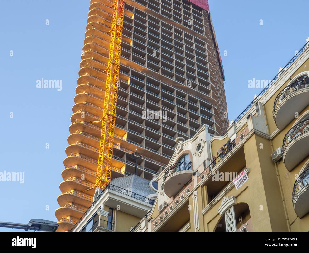 The frame of a high-rise building under construction. Reinforced ...