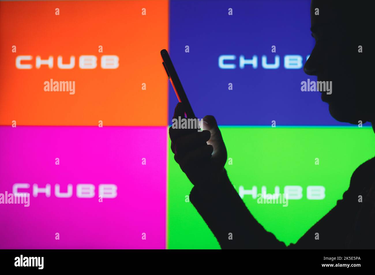 In this photo illustration, a woman's silhouette holds a smartphone ...