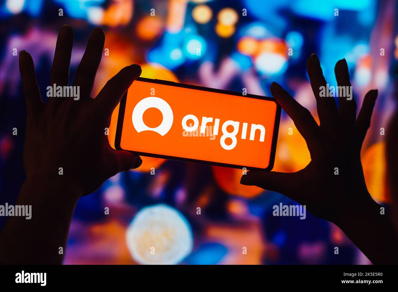 In this photo illustration, the Origin Energy logo is displayed on a ...