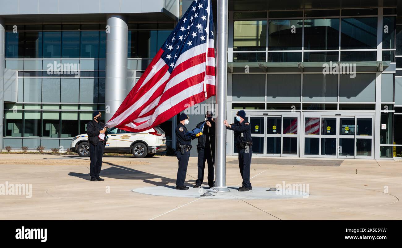 On Jan. 26, 2022, the U.S. and NASA flags were raised at Building 4221 ...