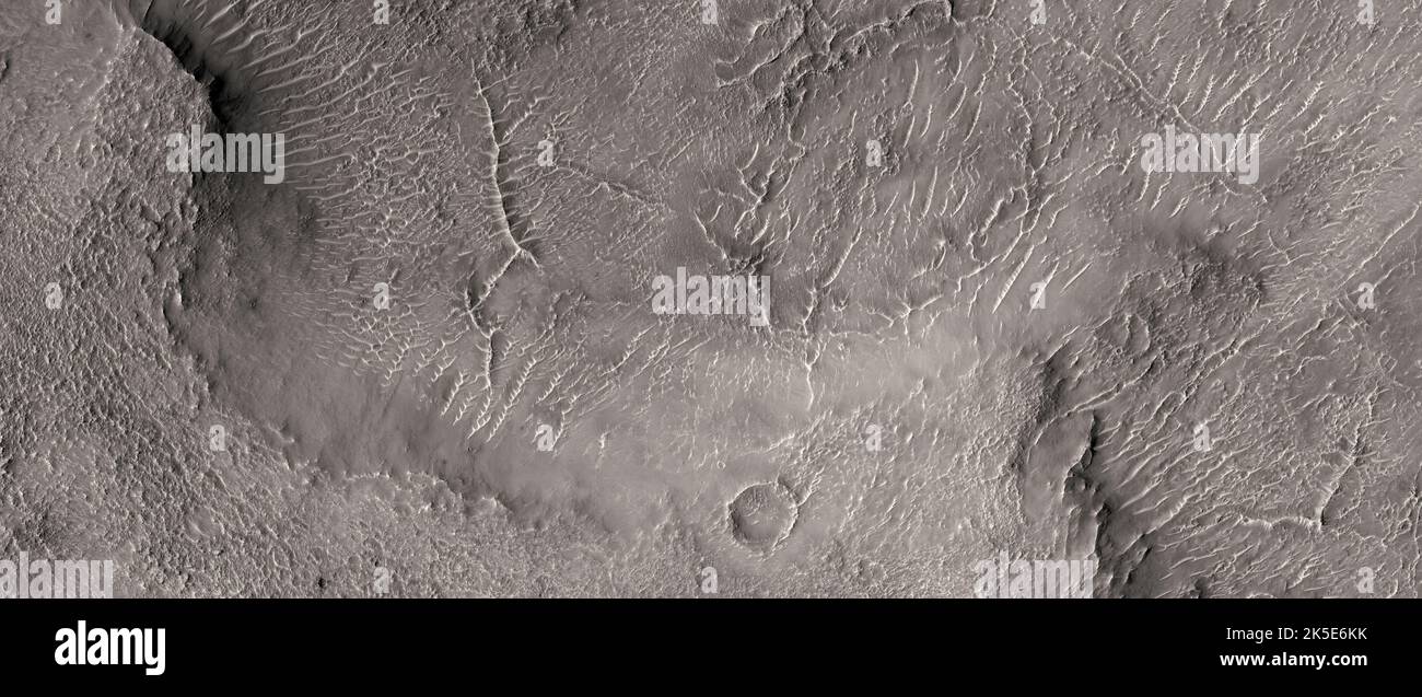 Martian landscape. This HiRISE image shows a graben - a depression that ...