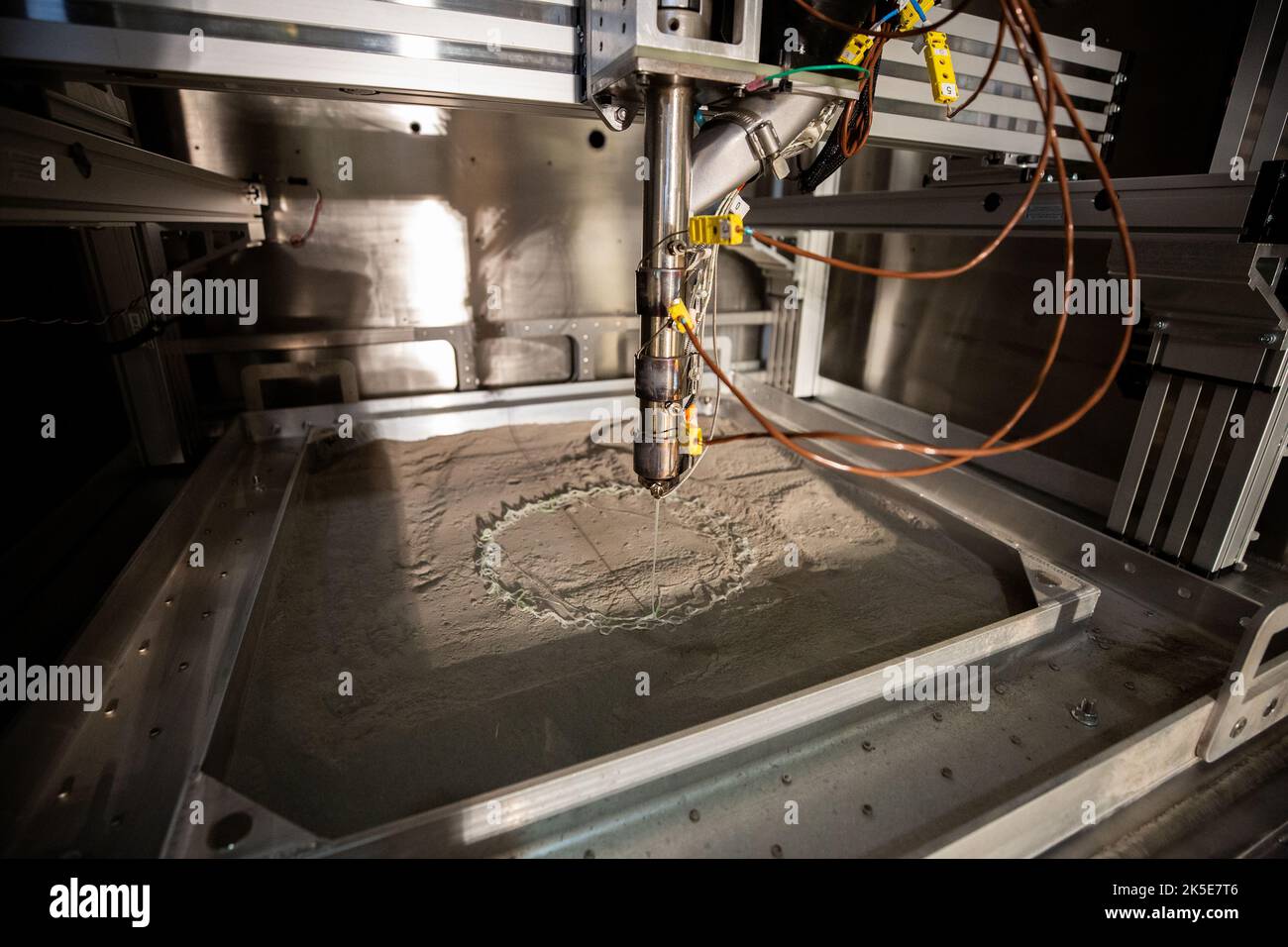 A team at NASA’s Kennedy Space Center in Florida test a 3D printer ...