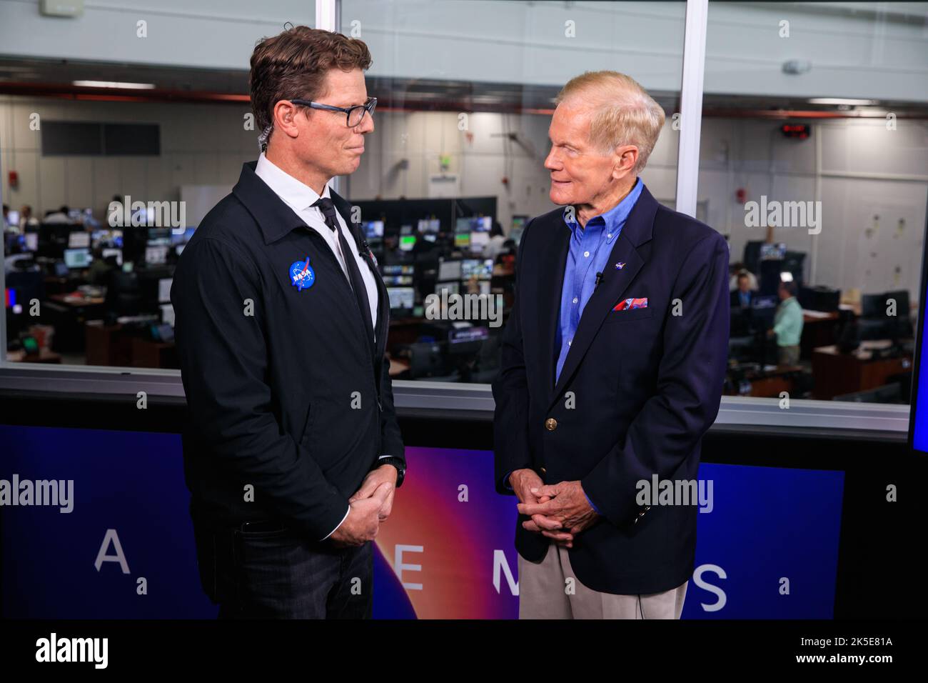 NASA commentator Derrol Nail, at left, talks with NASA Administrator ...