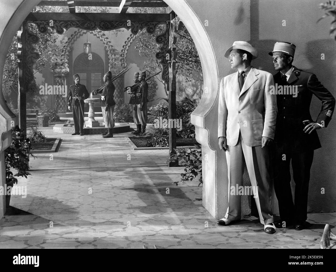 Dennis Morgan (second right), on-set of the Film, "The Desert Song ...