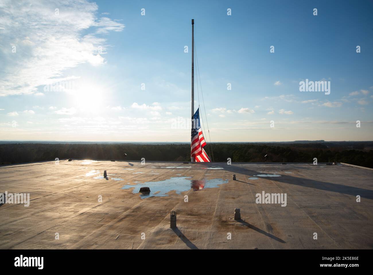 The U.S. and NASA flags atop Building 4200 at NASA Marshall Space ...