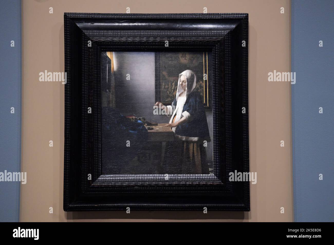 Johannes Vermeer Woman Holding A Balance